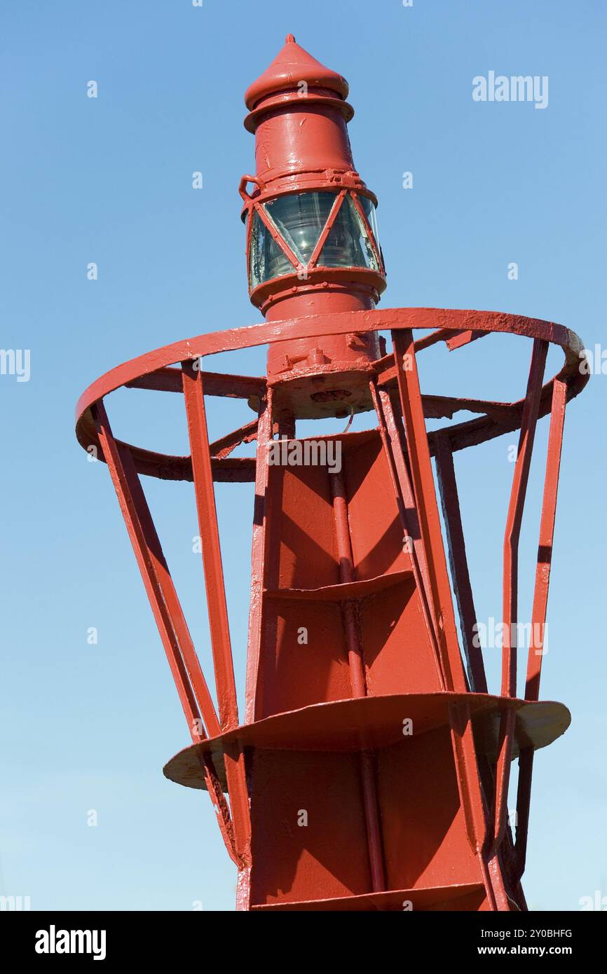 Red buoy in front of blue sky Stock Photo - Alamy