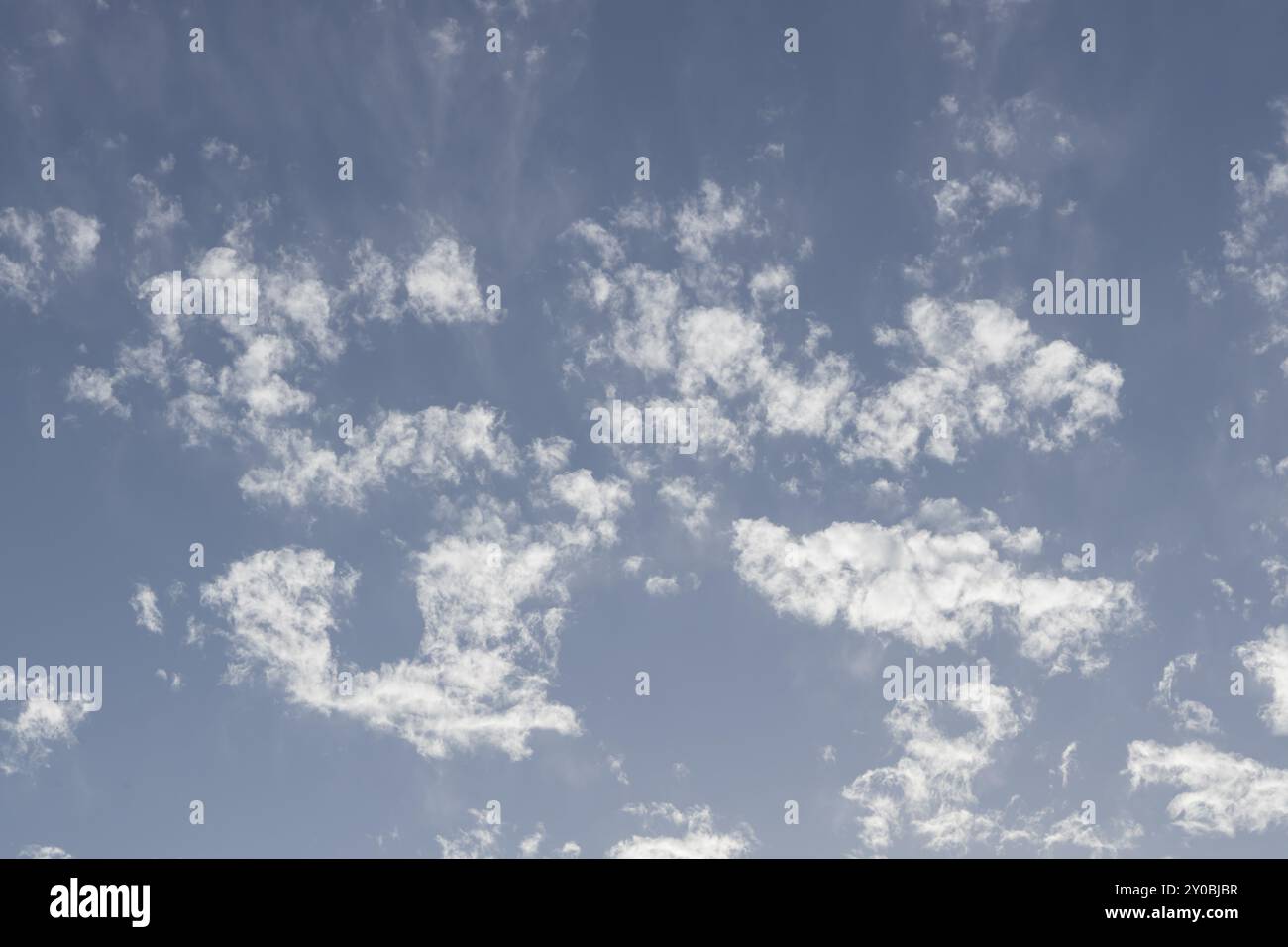 Cumulus white clouds in a blue sky, England, United Kingdom, Europe ...
