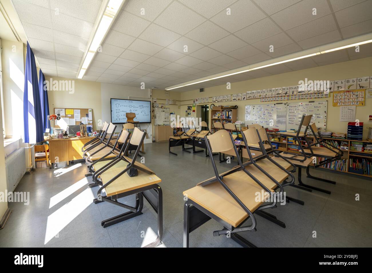 Classroom of a fourth grade, after school, the building is older but in ...
