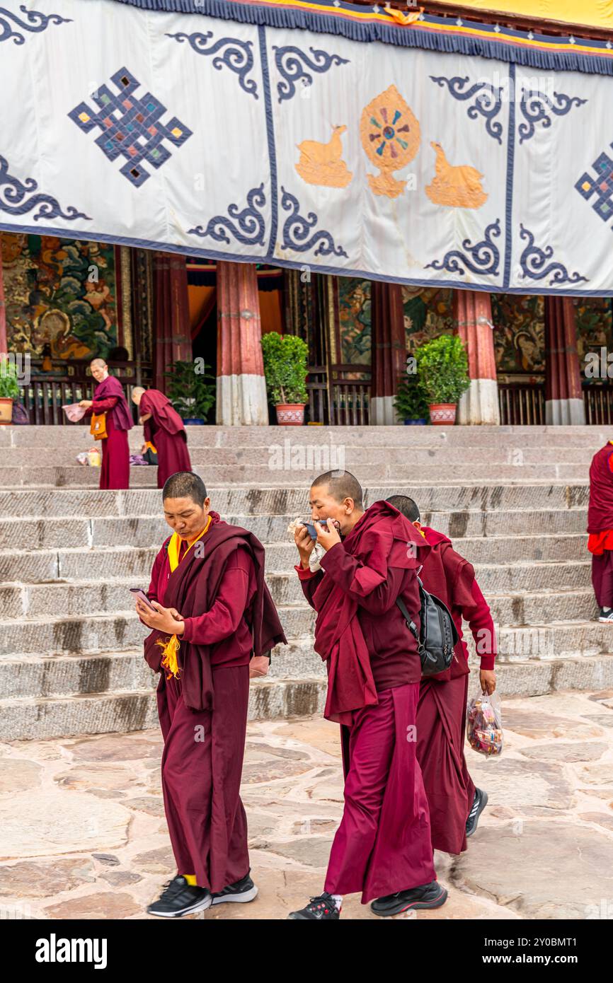 LHASA, TIBET, China - MAY 1, 2022: Monks leave the main assembly hall ...