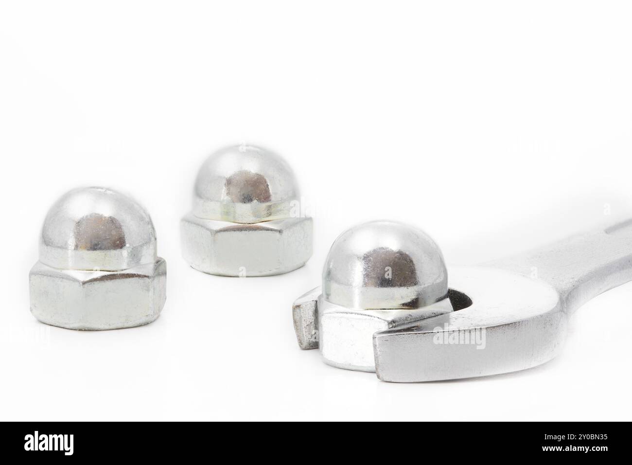 Cap nuts with spanner Stock Photo - Alamy