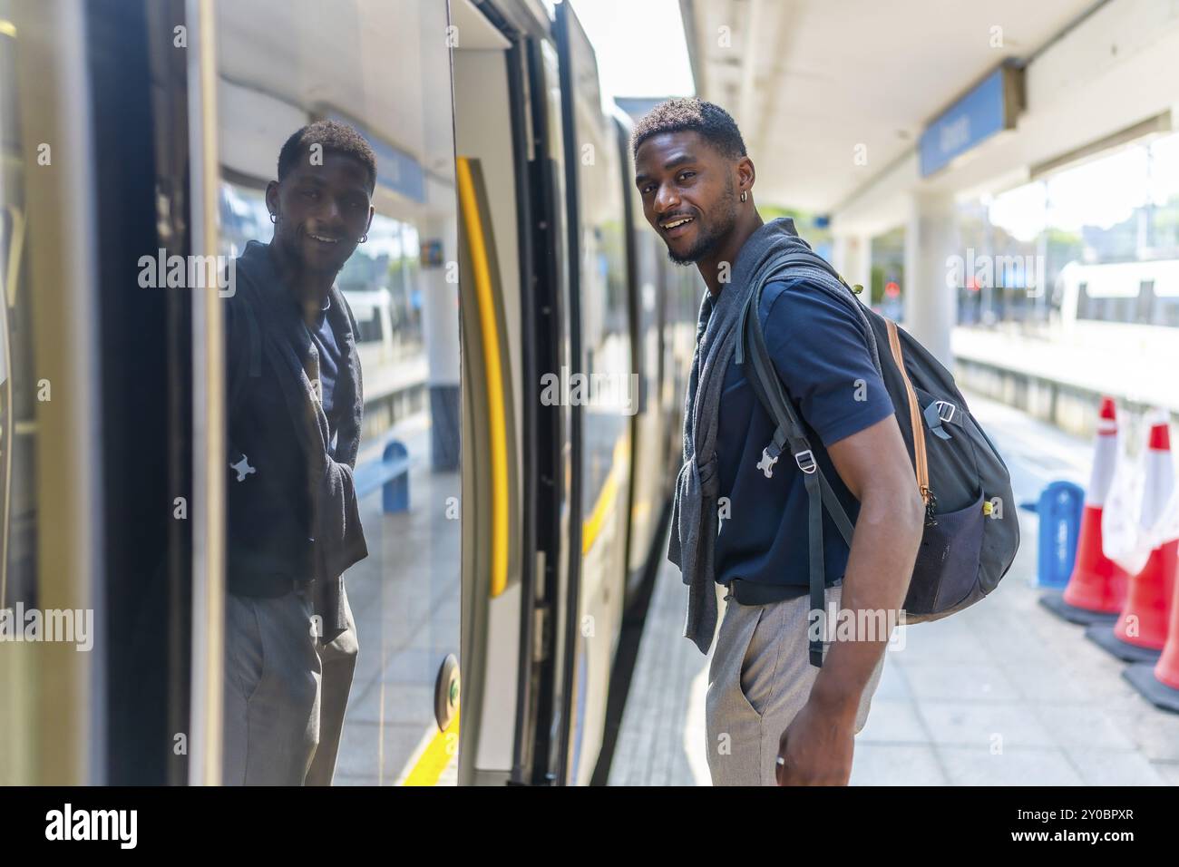 Side view photo of a confident young African casual businessman ...