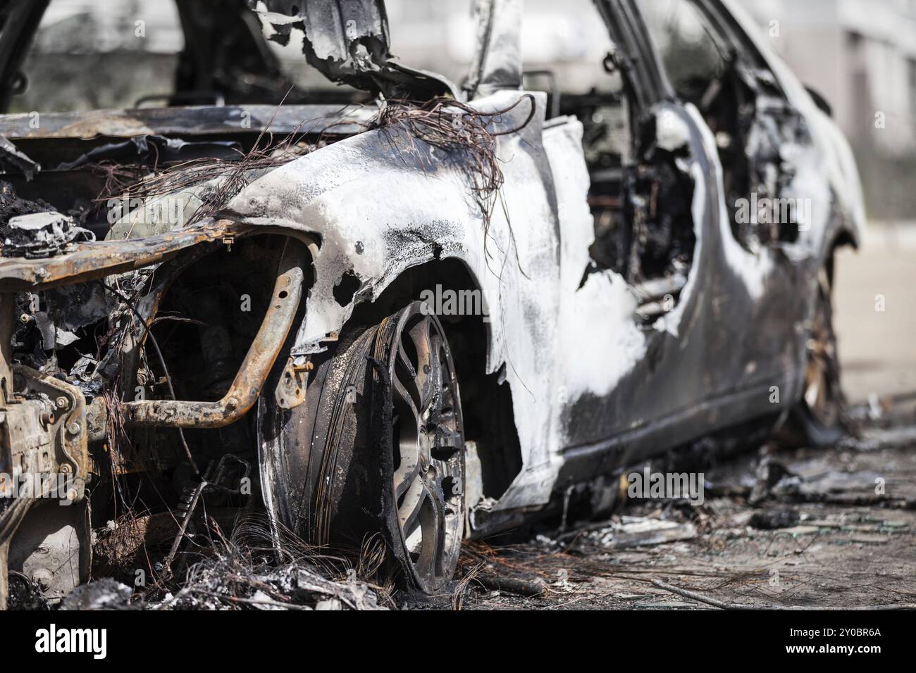 Road wreck accident or arson fire burnt wheel car vehicle junk Stock ...