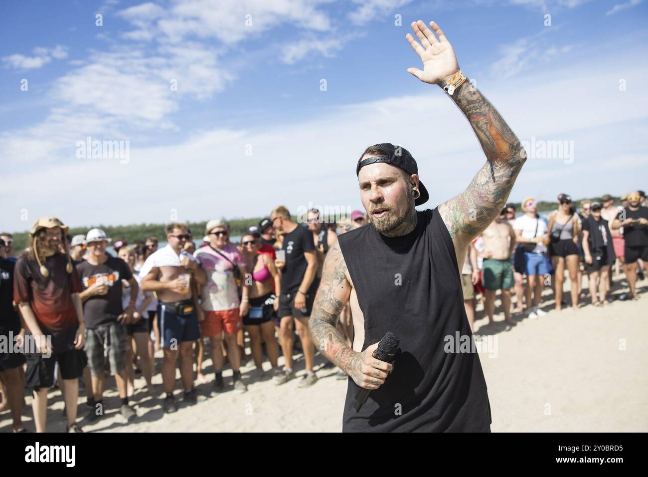 Matthias Engst, singer of the band Engst on the beach in front of the ...