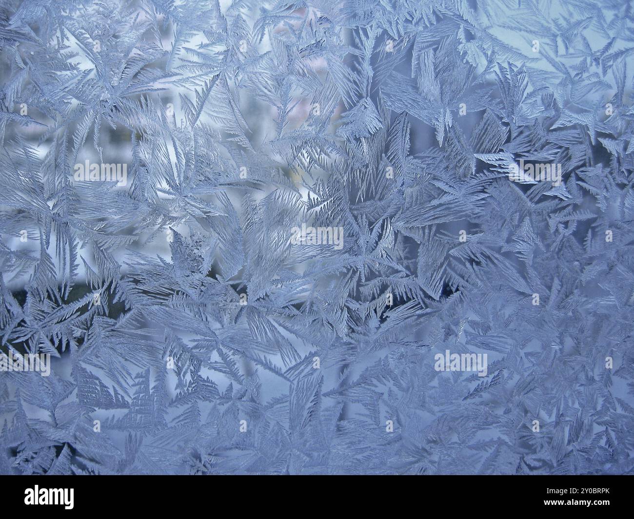 Nature background with ice pattern on winter glass Stock Photo - Alamy