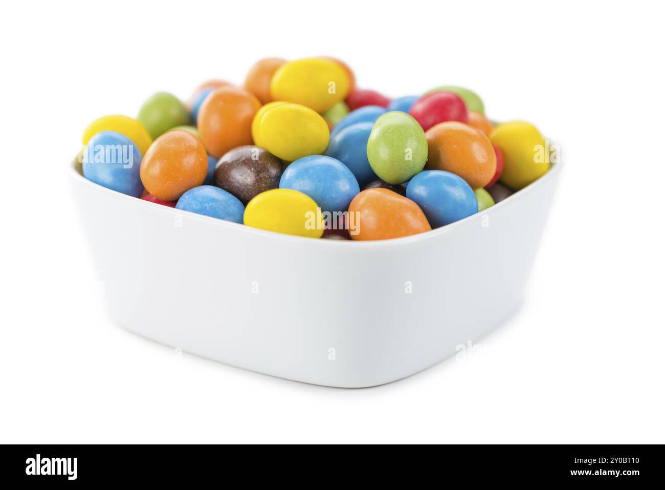 Portion of Cocolate coated Peanuts (as close-up shot) isolated on white ...