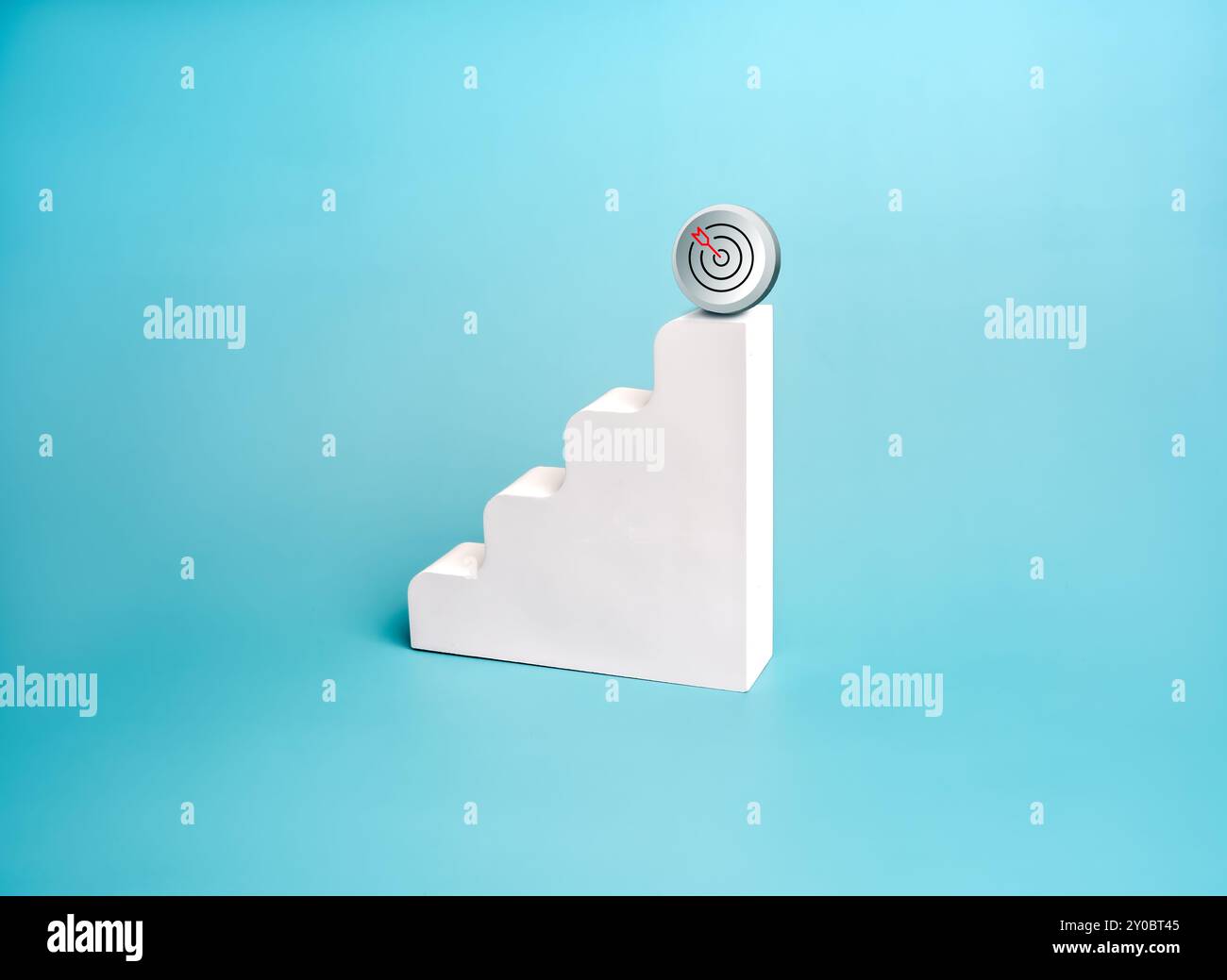 Small 3d goal target icon on top white minimalist geometric stairway as ...