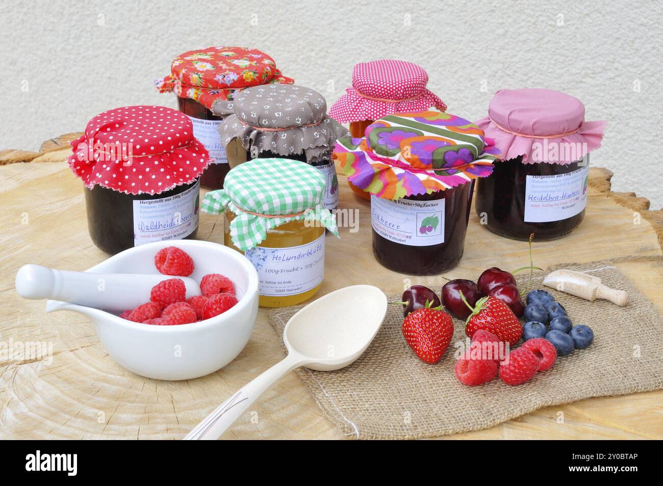 Jam boil from fresh fruits. Different types of jam Stock Photo - Alamy