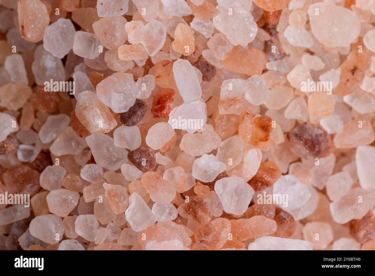 A large number of pink salt crystals of different sizes, a lot of pink ...