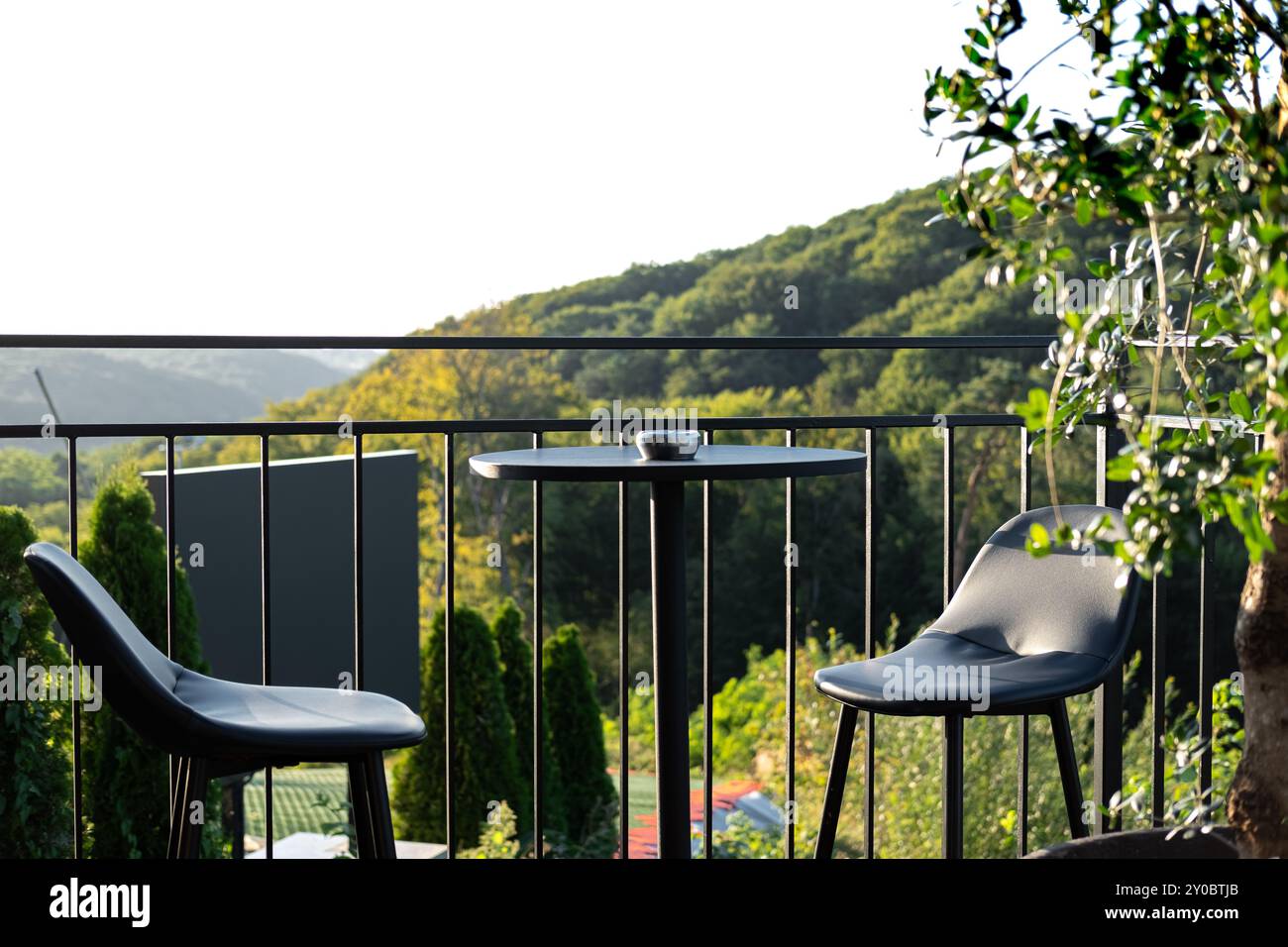 Scenic Balcony with Modern Furniture Overlooking Nature Stock Photo - Alamy