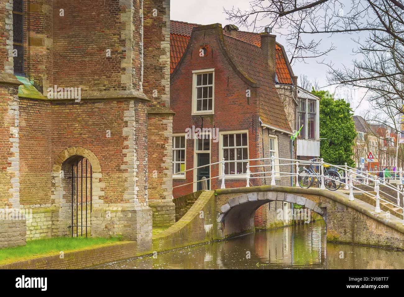 Delft, Netherlands street view with traditional dutch houses, bridge ...