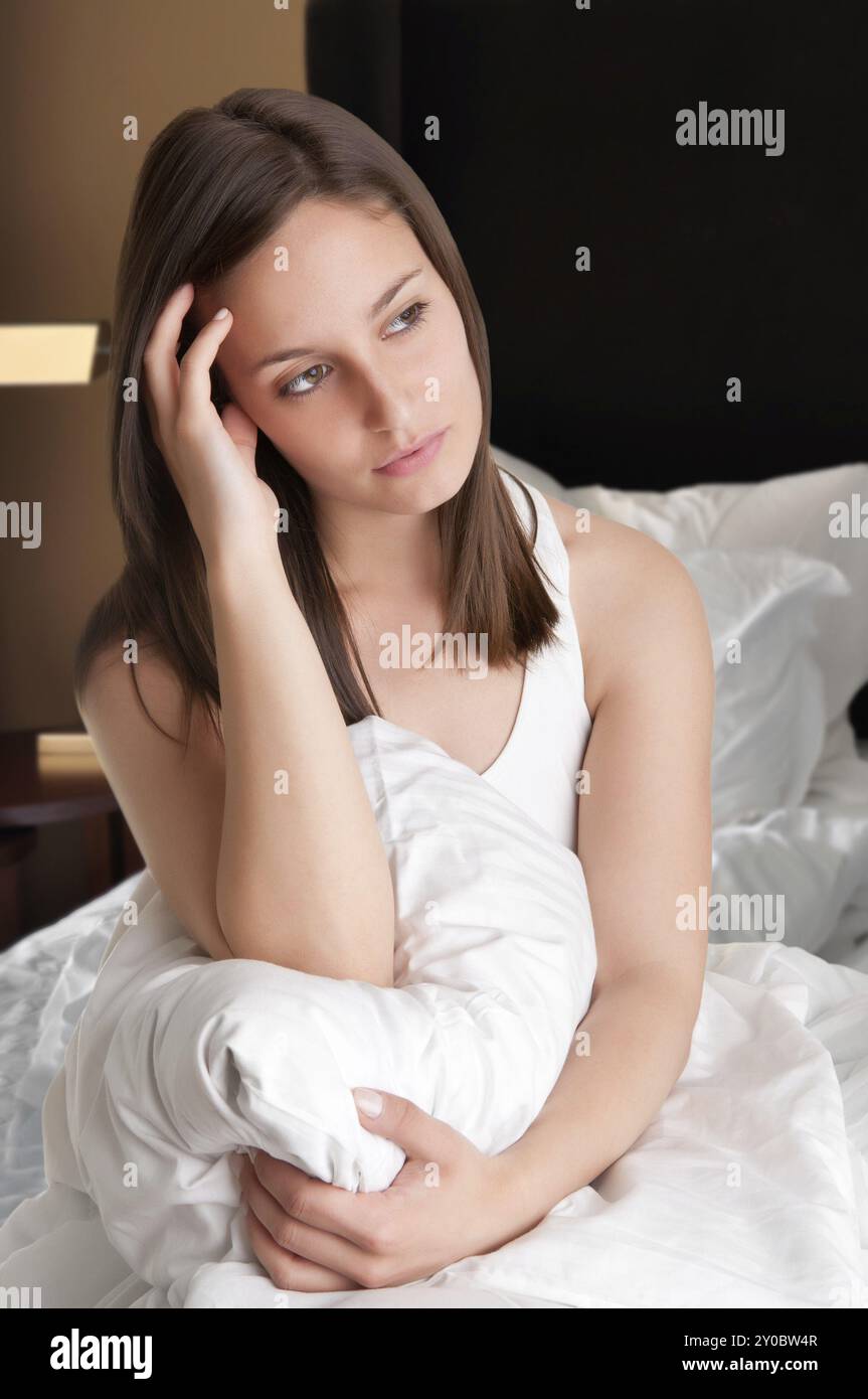 Woman lying on bed take hi-res stock photography and images - Alamy