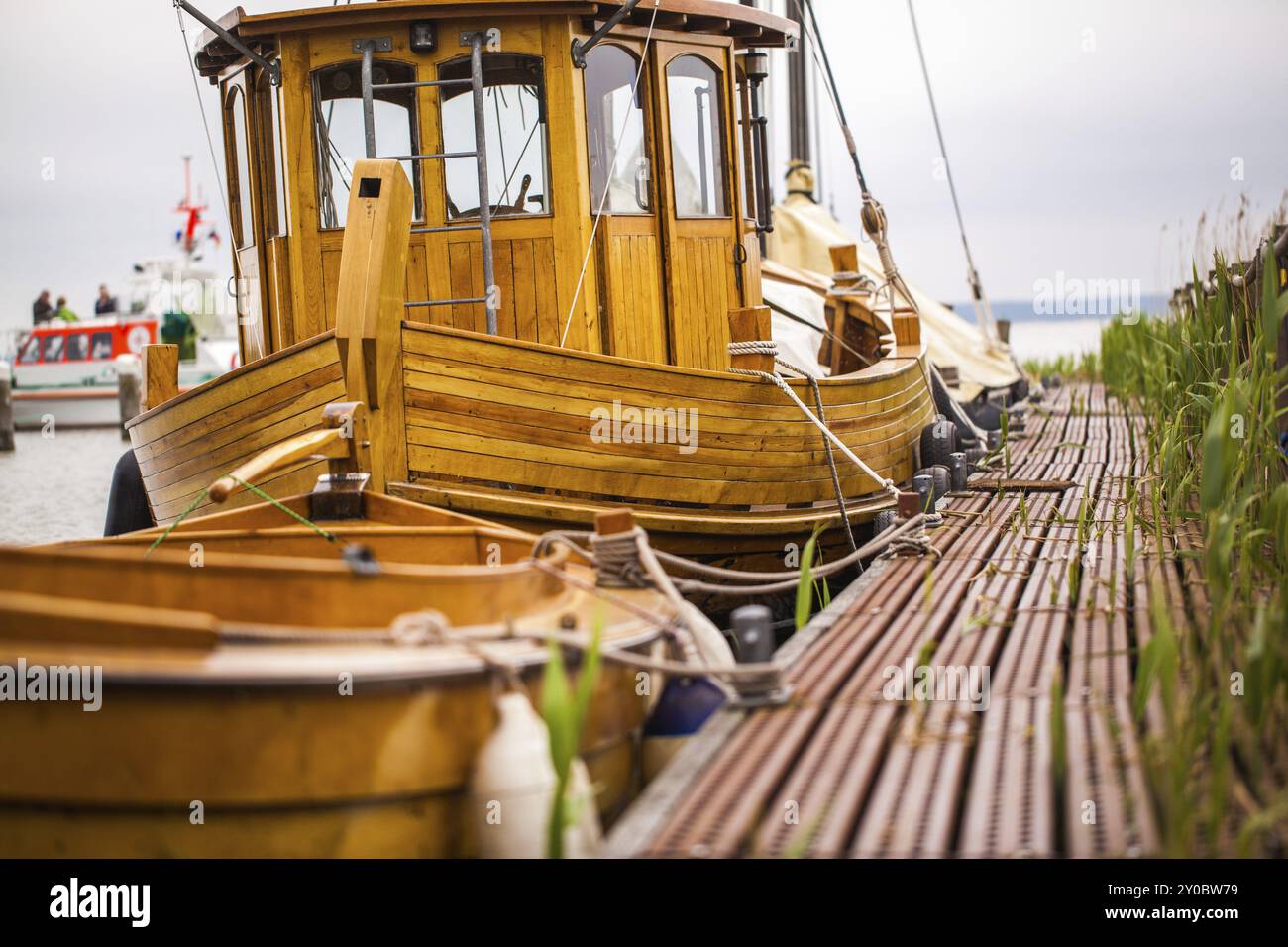 Vintage style boats in a small harbour Stock Photo - Alamy