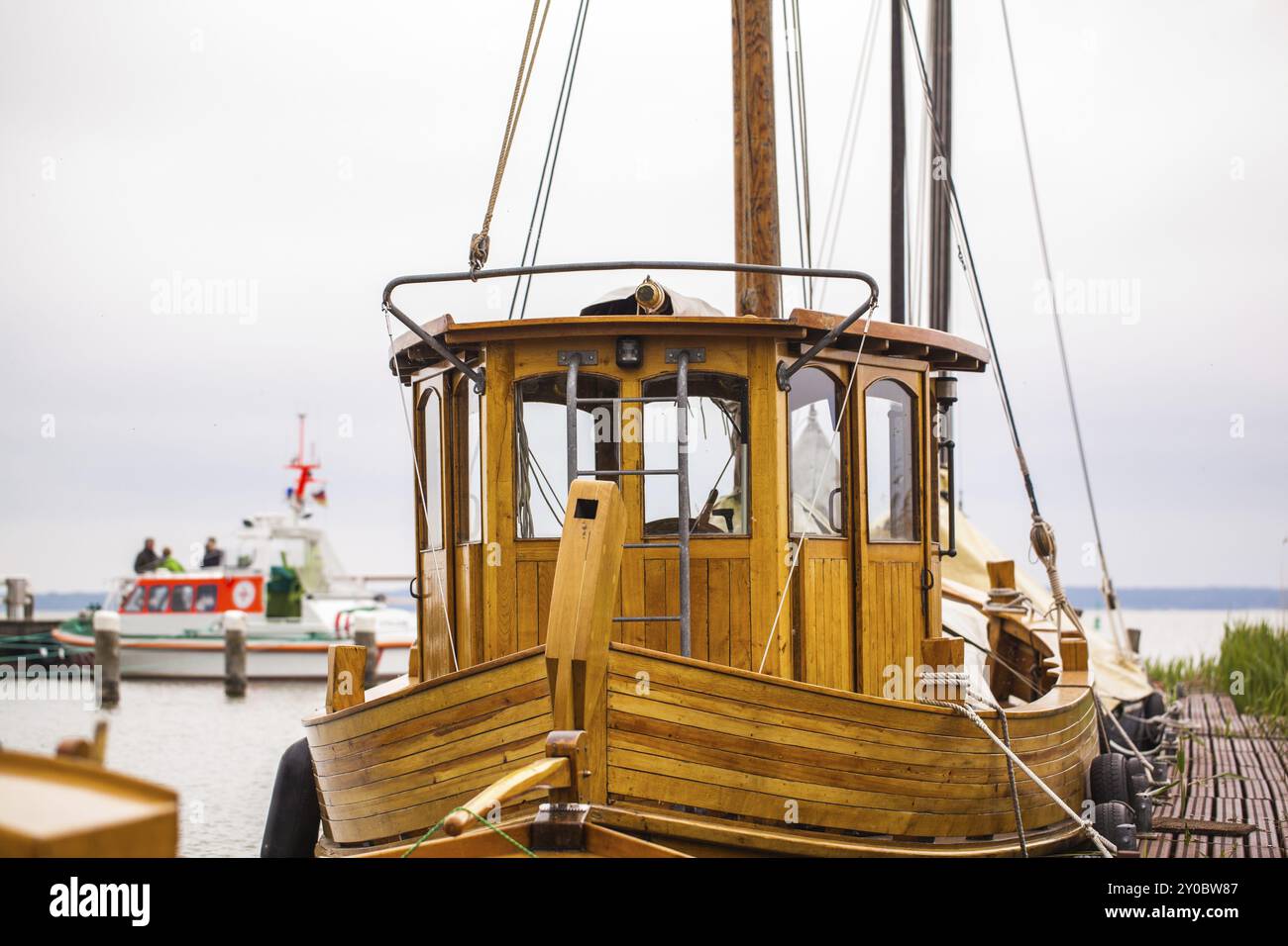 Vintage style boats in a small harbour Stock Photo - Alamy