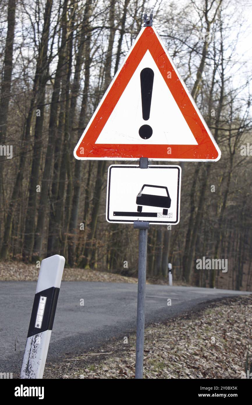 Attention unpaved verge Stock Photo - Alamy