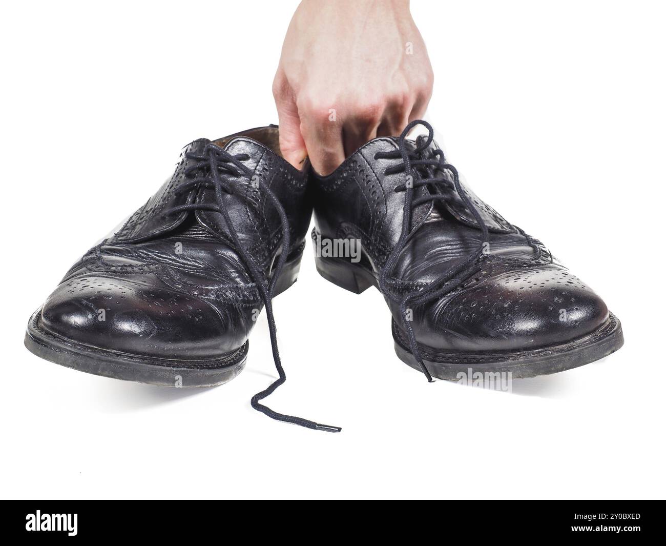 Mans hand holds up pair hi-res stock photography and images - Alamy