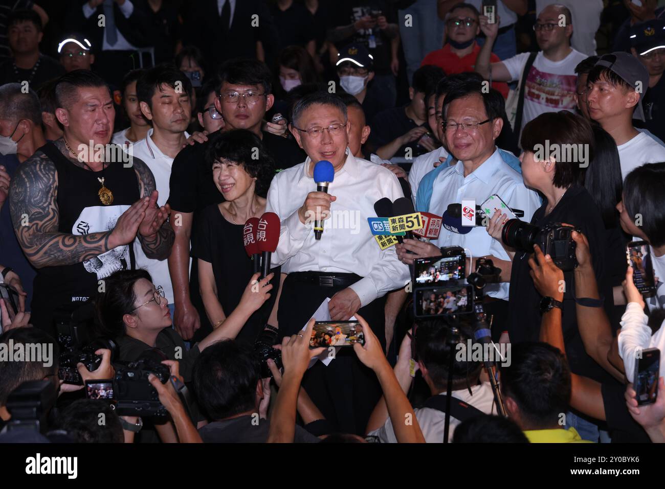 Taiwan People's Party Chairman Ko Wen-je speaks to supporters as he is ...
