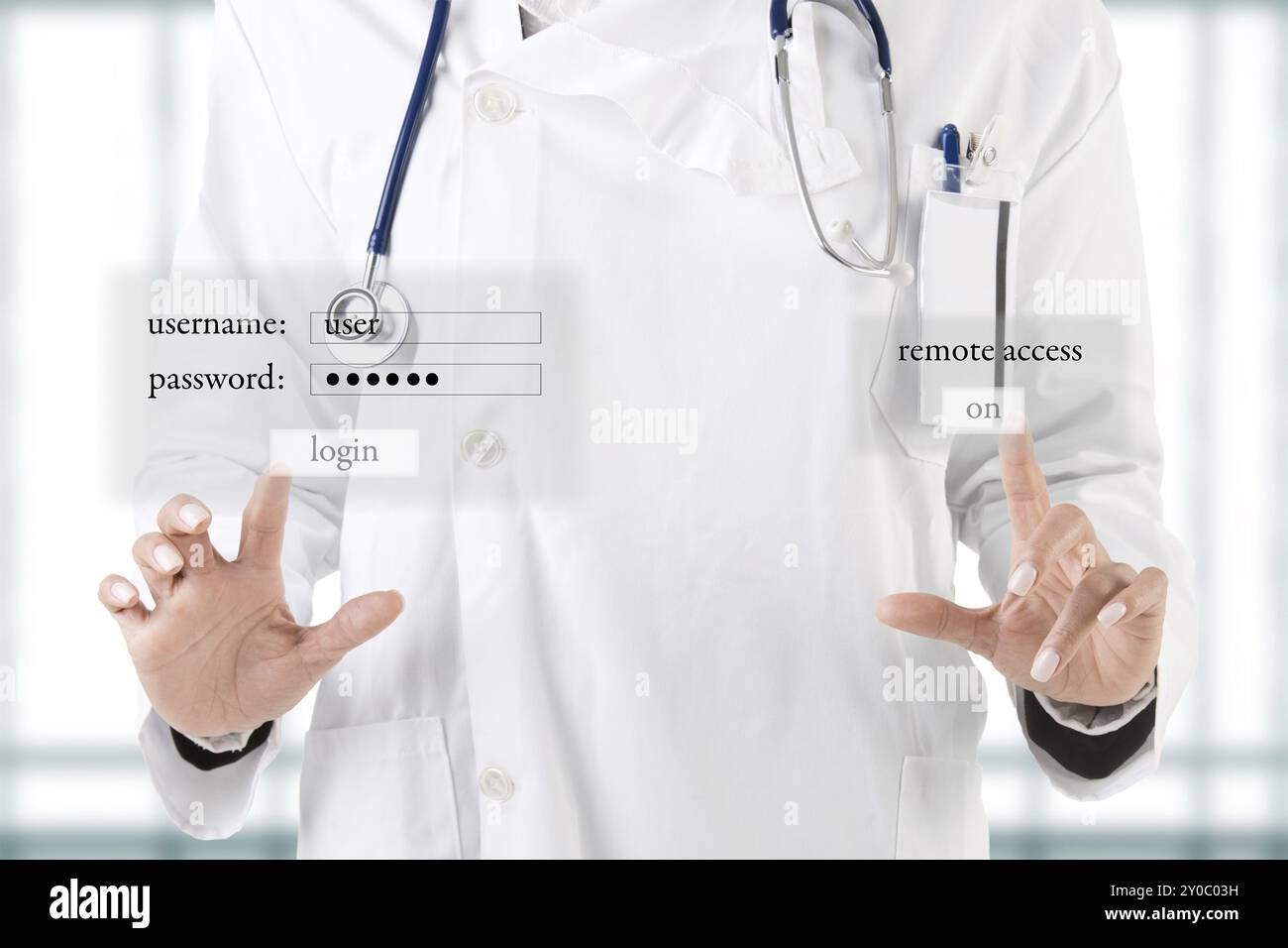 Female doctor logging into a computer system Stock Photo - Alamy