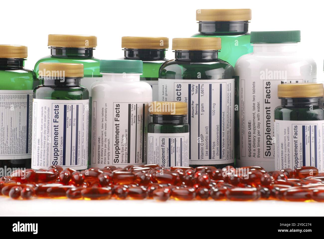Composition with dietary supplement capsules and containers Stock Photo ...