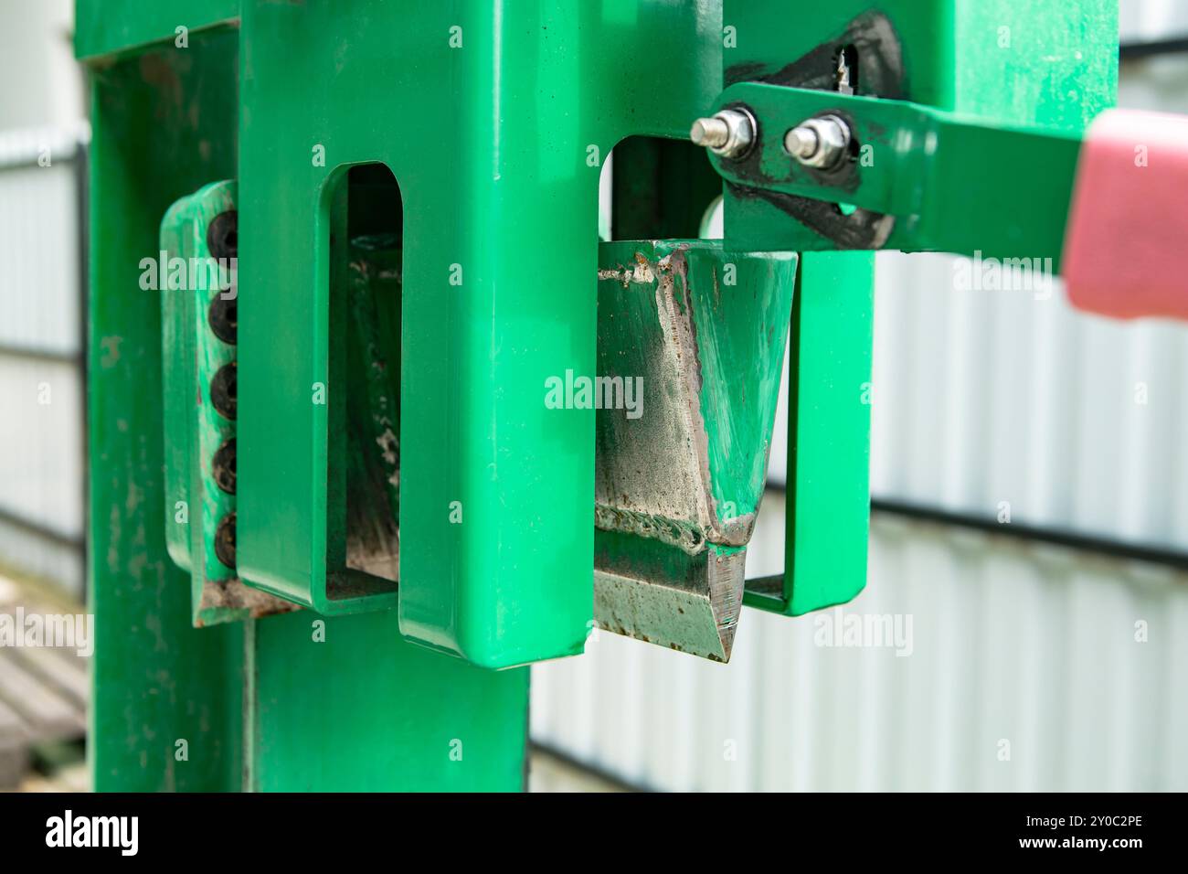Vertical wood splitter steel blade, detail of a log chopper hydraulic ...