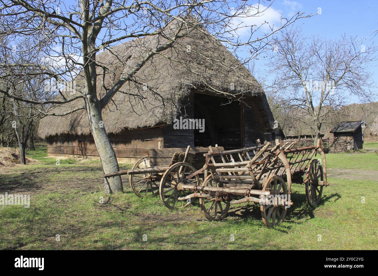 Farm carts in front of the barn Stock Photo - Alamy