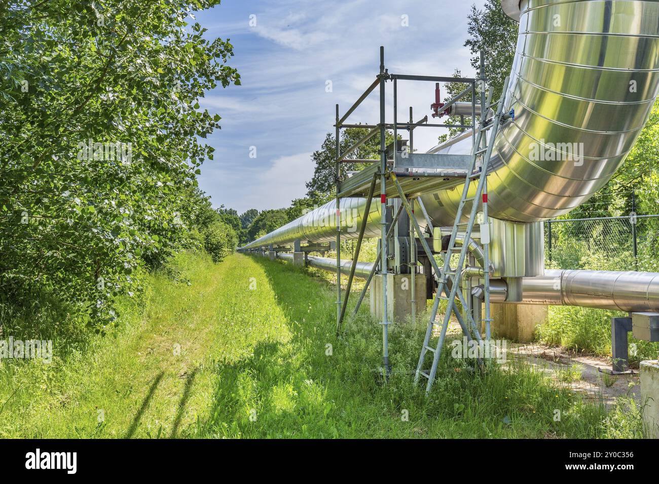Big metal gas pipeline distributes gas Stock Photo - Alamy