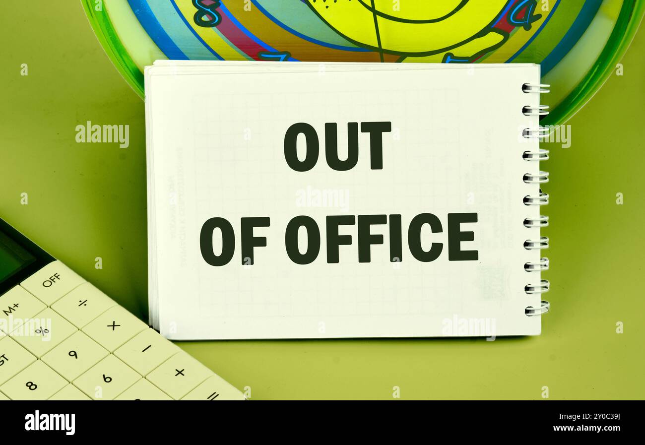 OUT OF OFFICE words written in the notebook, the front view Stock Photo ...