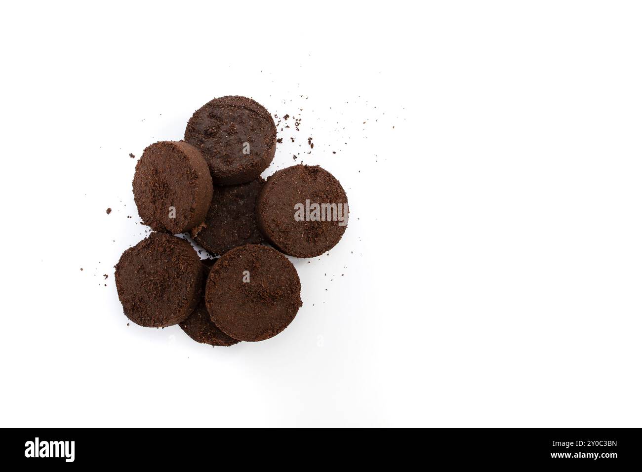 Dry coffee puck from espresso machine, isolated on white background ...