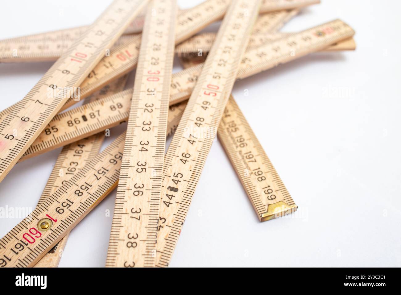 Abstract backdrop with a tangled wooden measuring meter, close up Stock ...