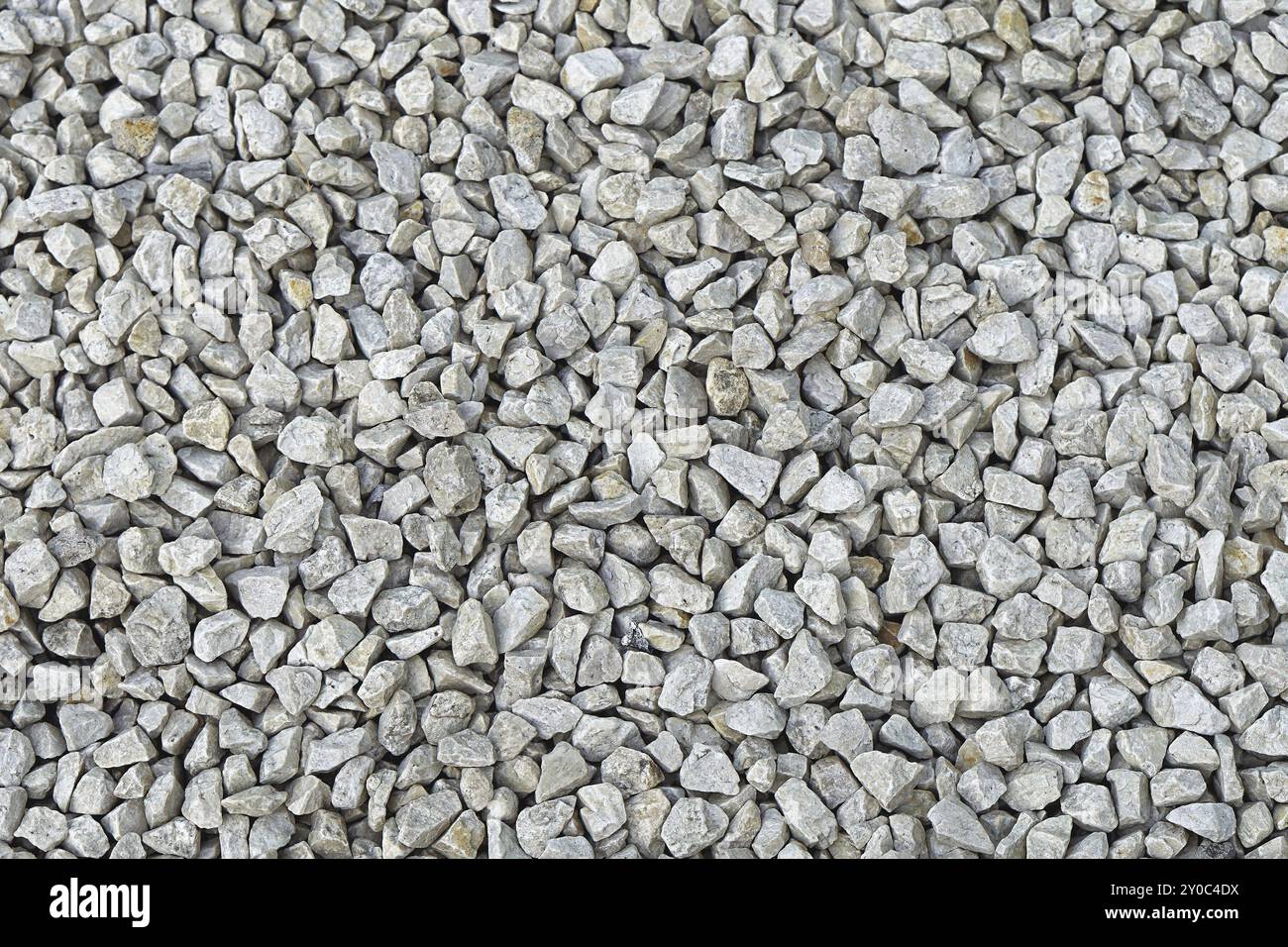 White gravel stones background texture Stock Photo - Alamy