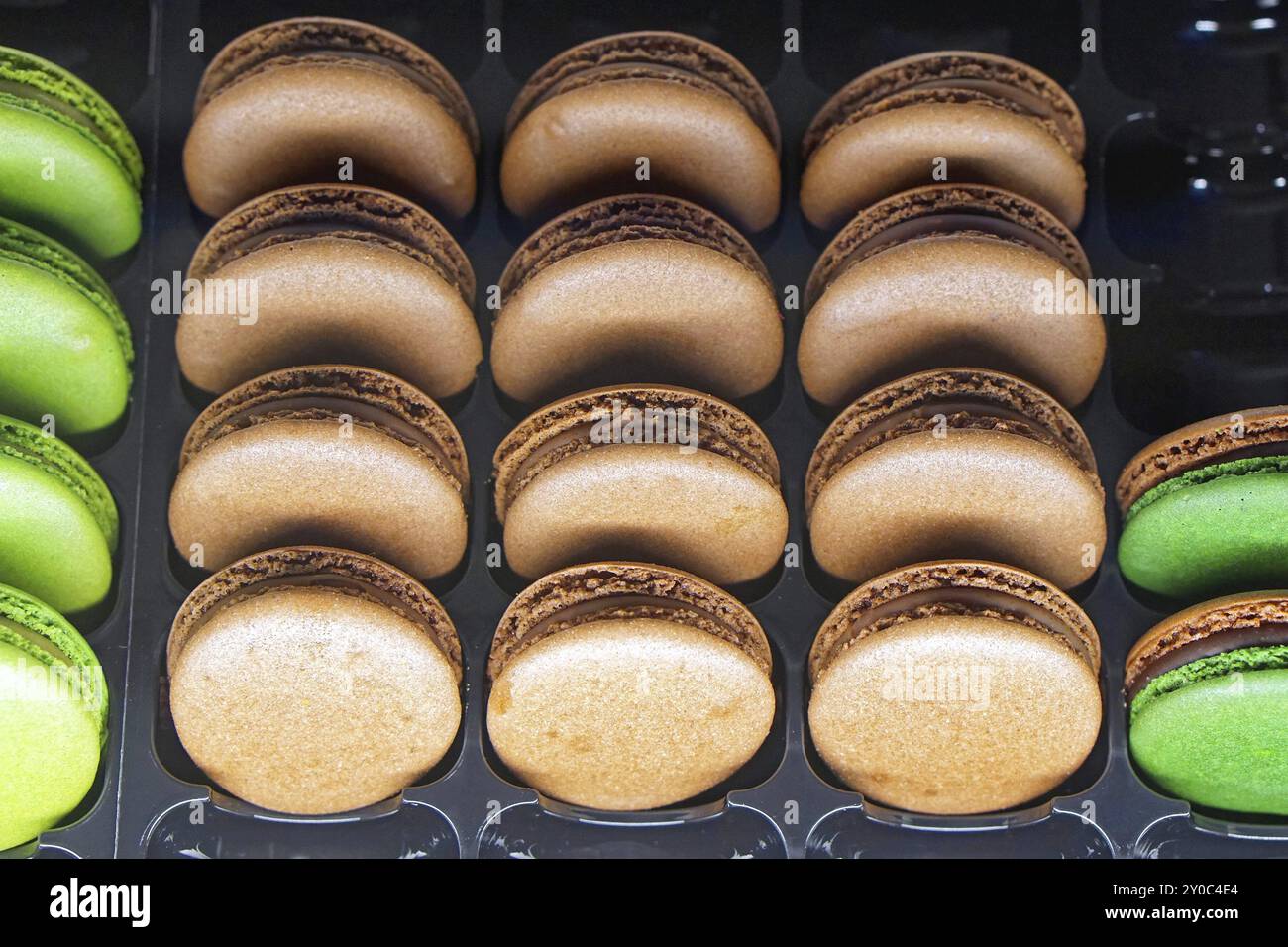 French chocolate macaroons cookies at tray Stock Photo - Alamy
