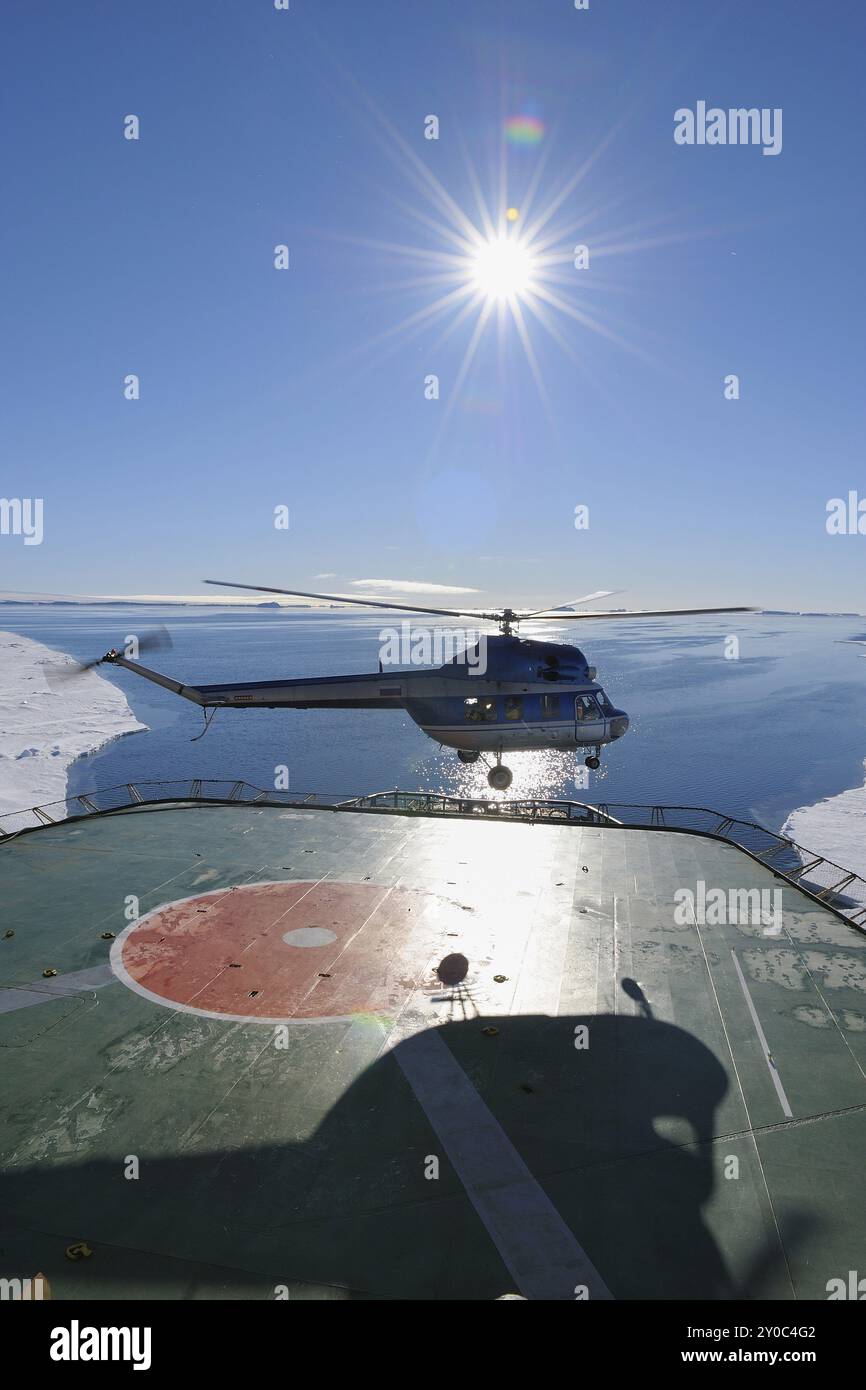 Helicopter landing on icebreaker, Snow Hill Island, Antarctic Peninsula ...