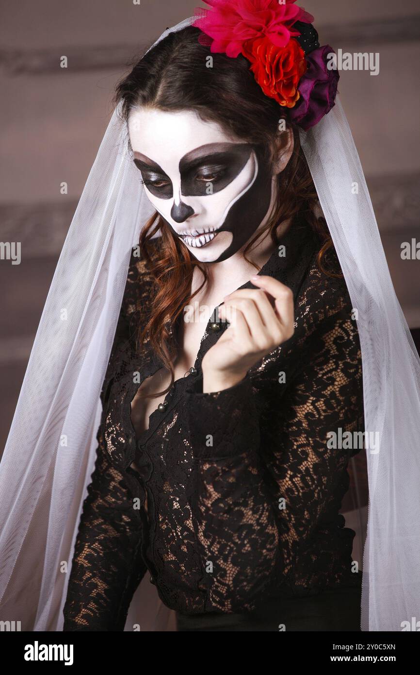 Beautiful woman painted as skeleton. Halloween theme Stock Photo - Alamy