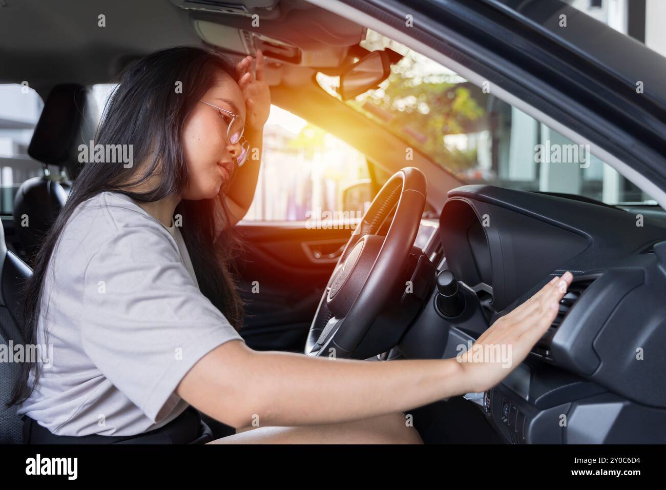 Hand checking the air conditioner in the car, The cooling system in the ...