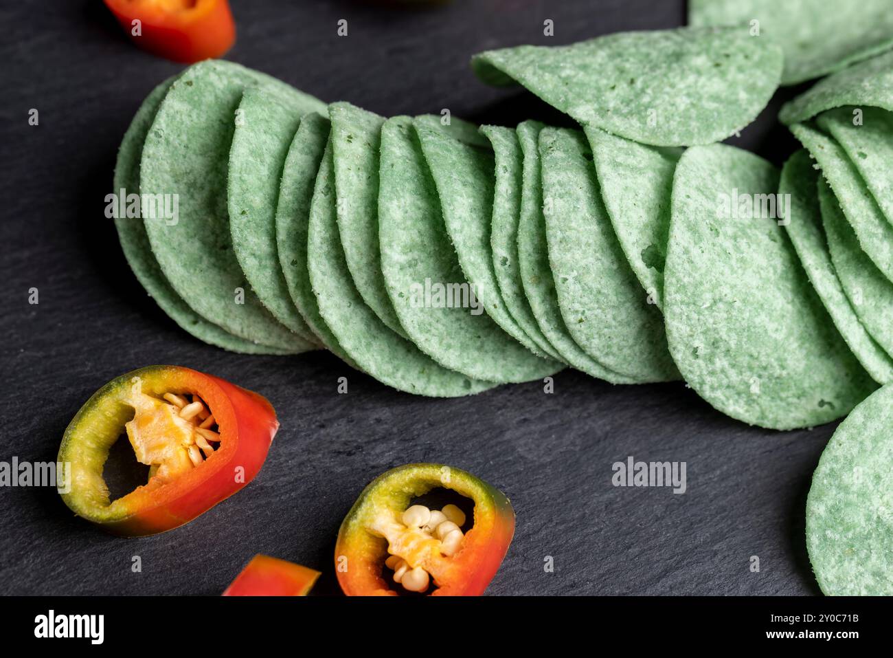 Thin and delicious green potato chips, crispy green chips with pepper ...