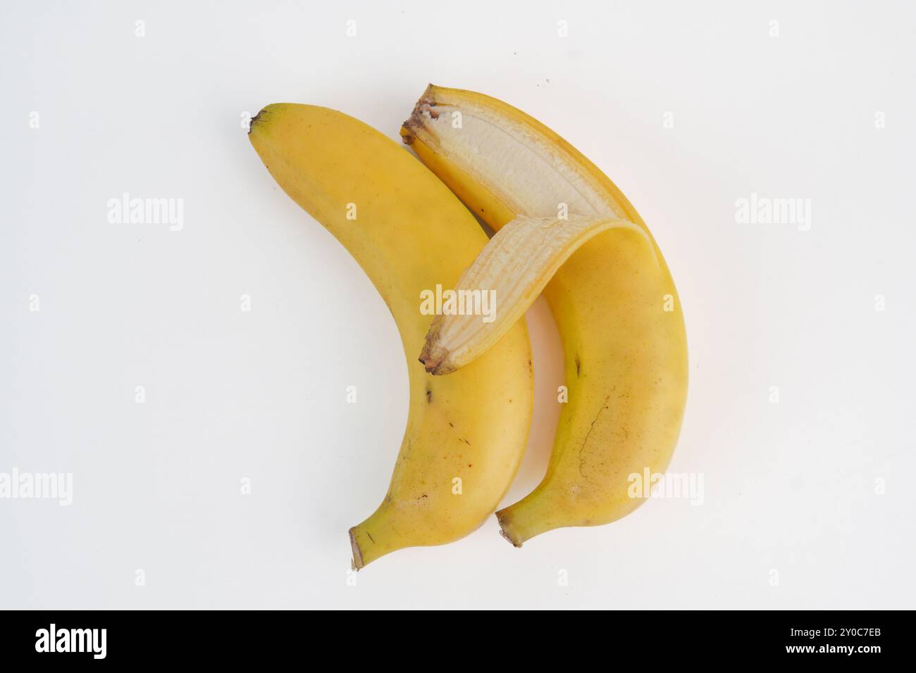 Peeled banana resembles a hugging hand. Sleeping and hugging banana ...