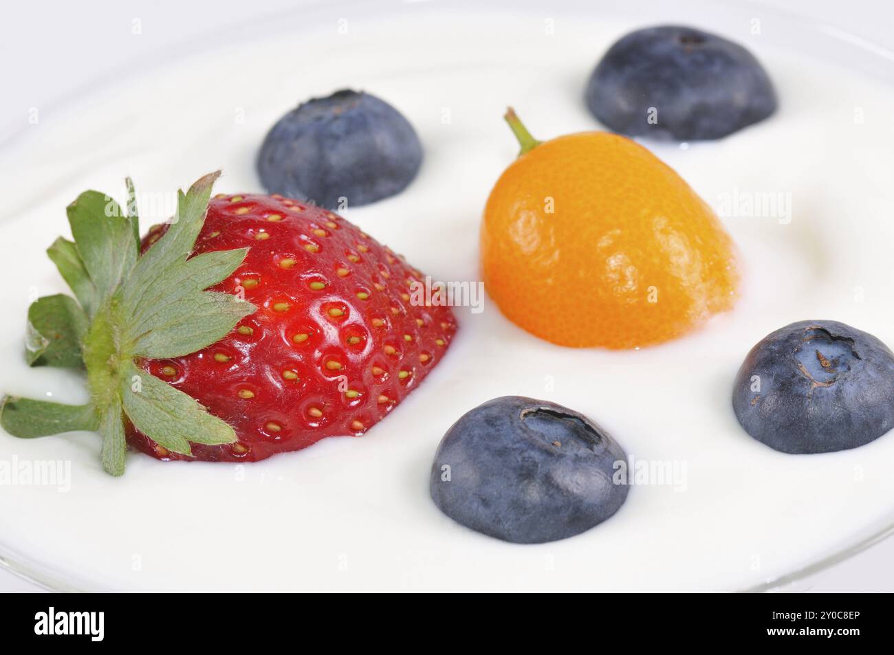 Various fruit and yoghurt. Fresh fruit on yoghurt Stock Photo - Alamy