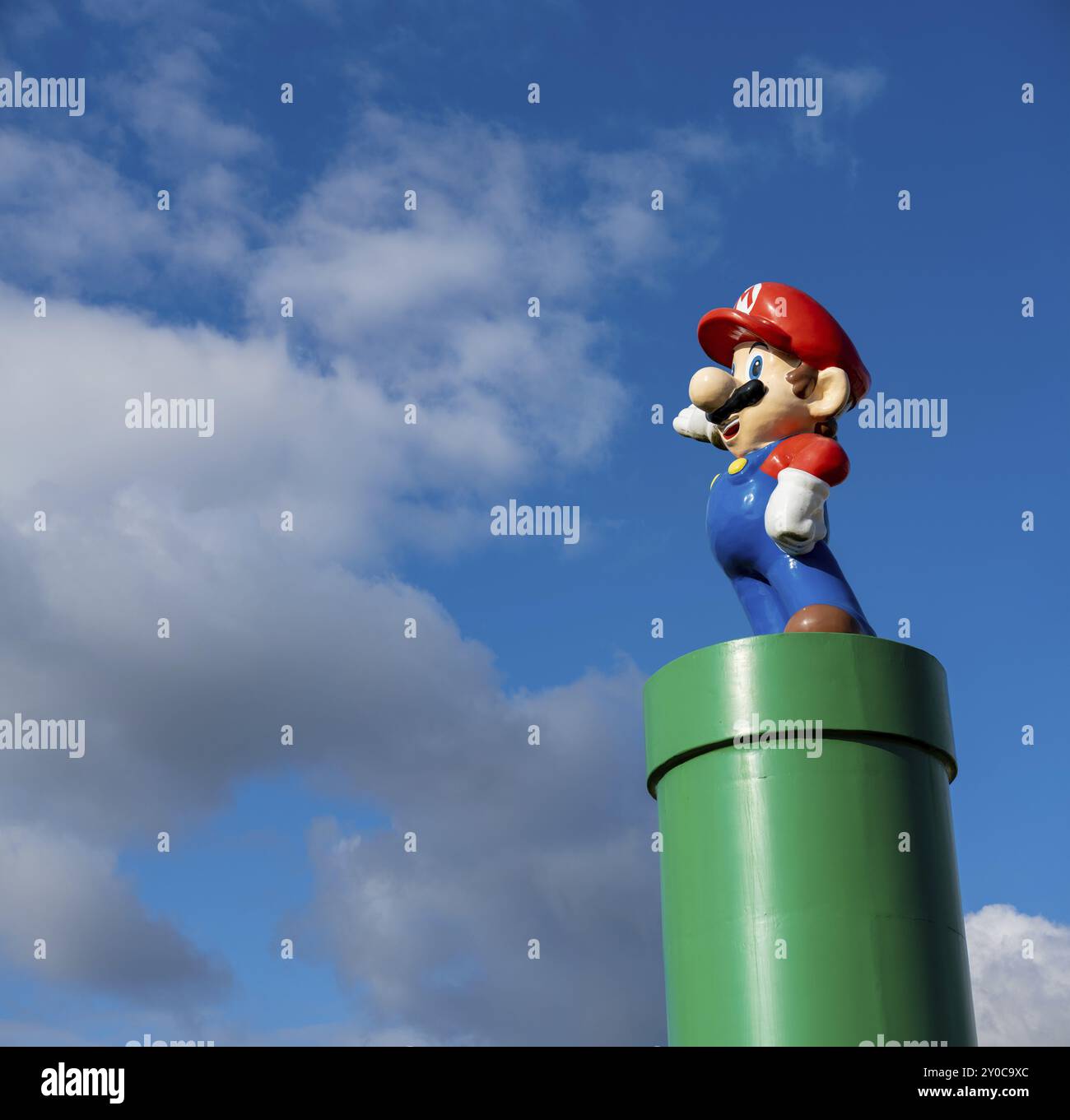 Kungsbacka, Sweden, september 11 2022: Mario statue on top of a green ...