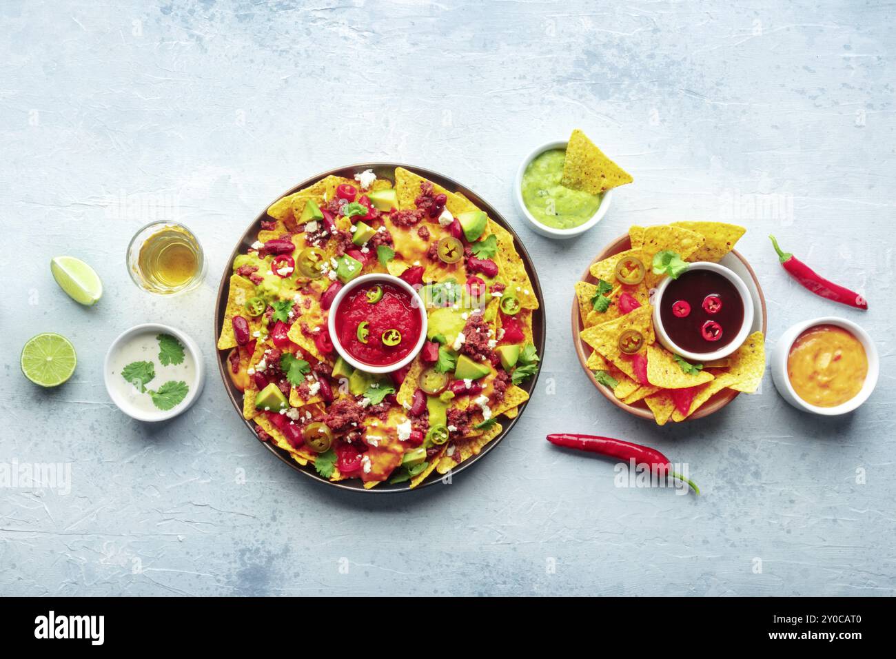 Loaded nachos. Mexican nacho chips with beef, overhead flat lay shot ...