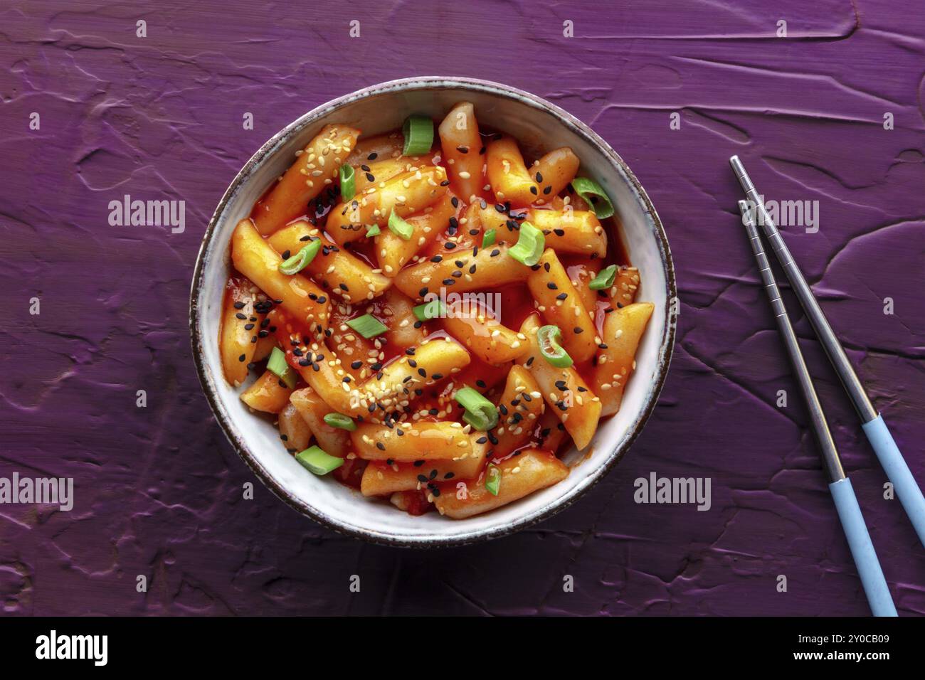 Tteokbokki or topokki, Korean street food, spicy rice cakes in red ...
