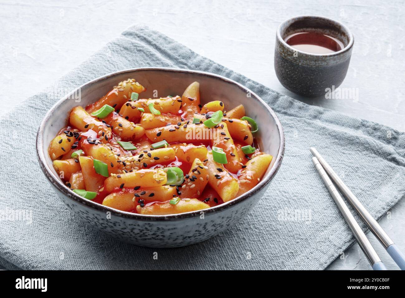 Tteokbokki or topokki, Korean street food, spicy rice cakes in red ...