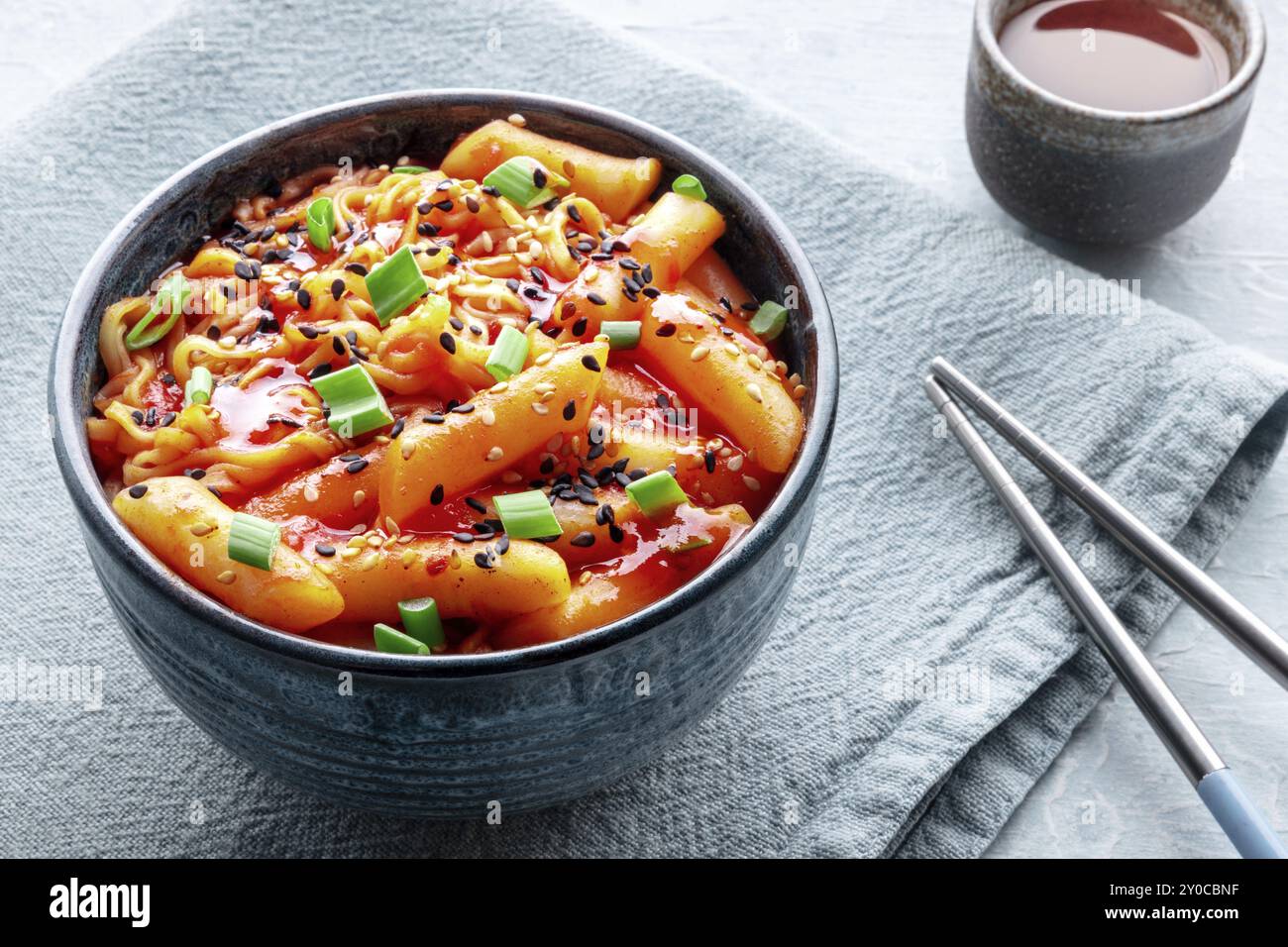 Rabokki, tteokbokki or topokki with ramen, Korean street food, spicy ...