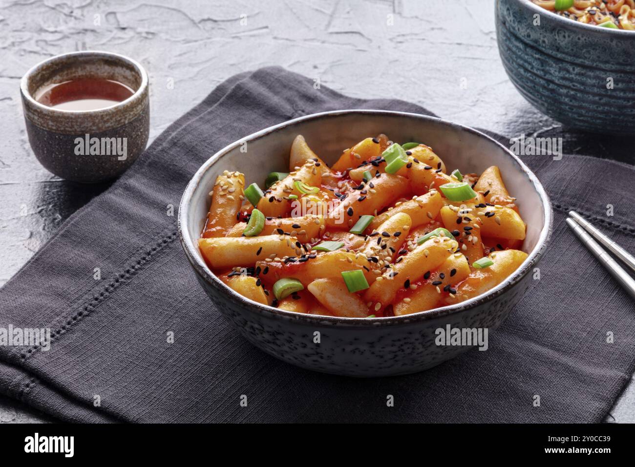 Tteokbokki or topokki, Korean street food, spicy rice cakes in red ...