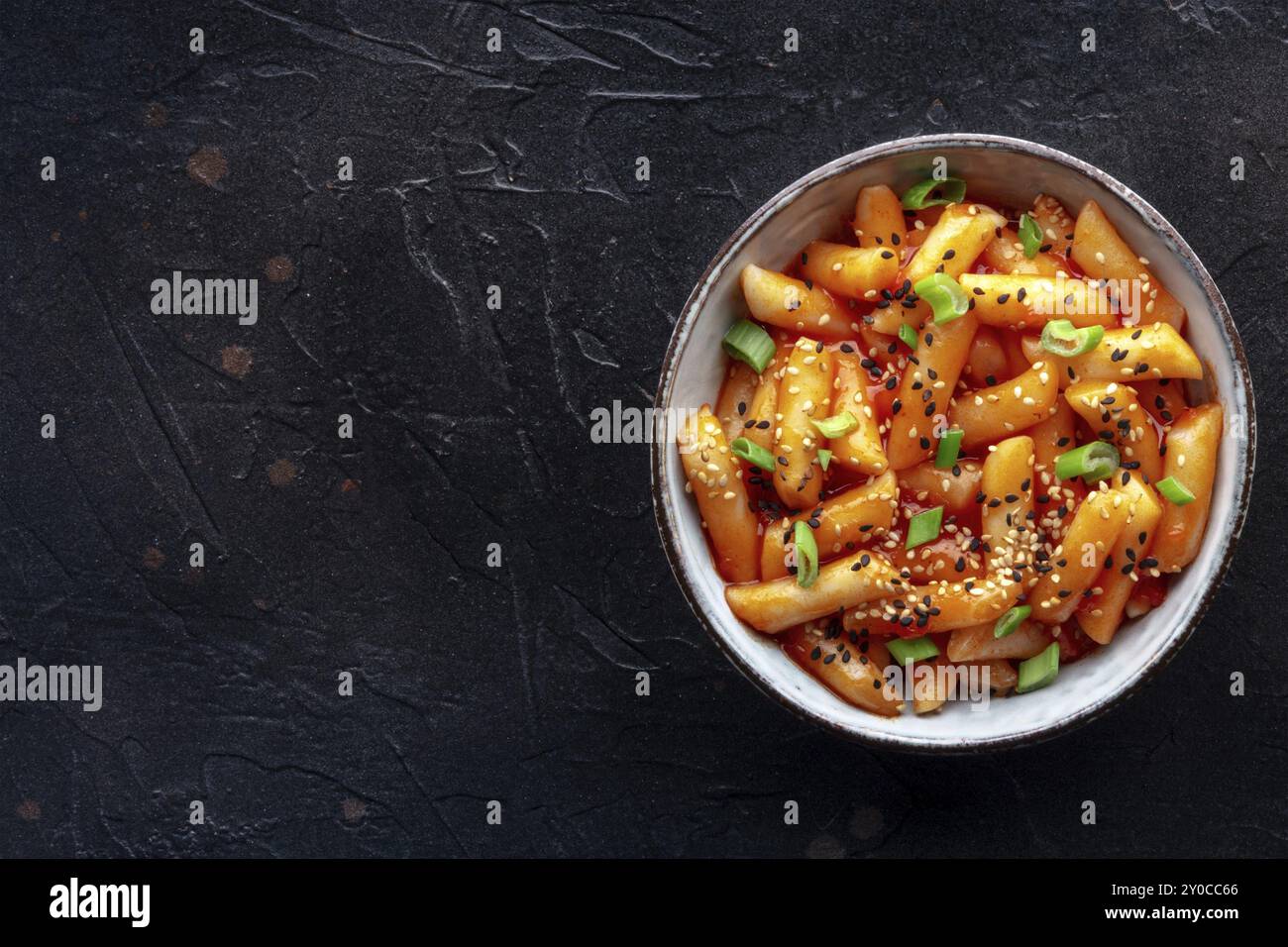 Tteokbokki or topokki, Korean street food, spicy rice cakes in red ...
