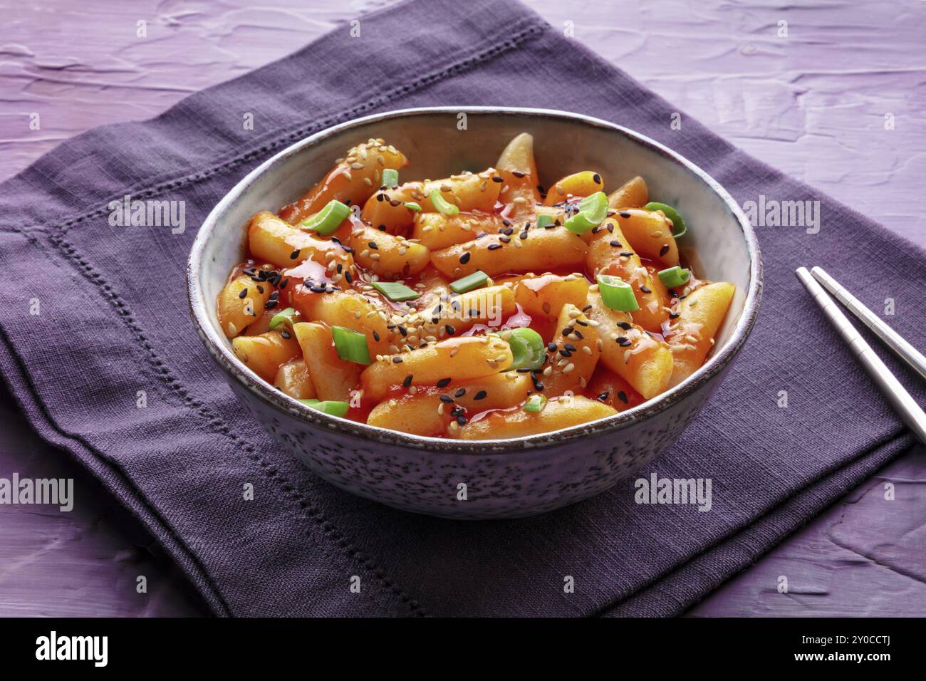 Tteokbokki or topokki, Korean street food, spicy rice cakes in red ...