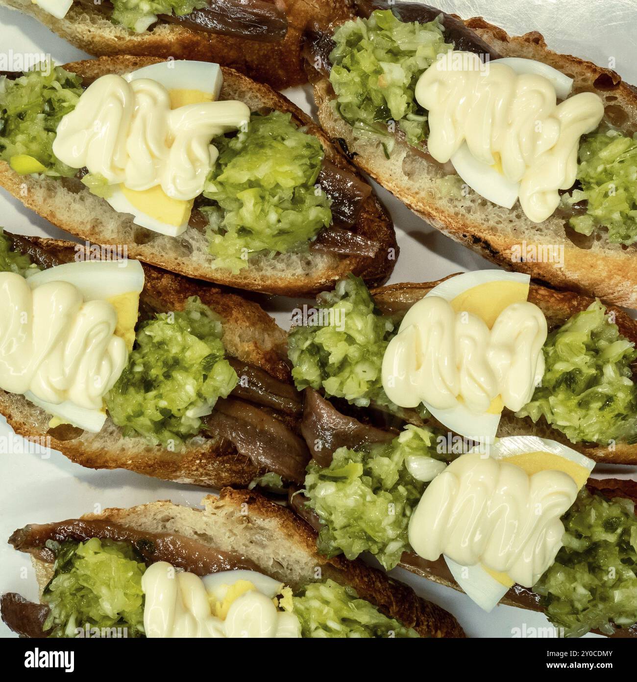 Tapas and pinchos at a food market in Spain. Traditional Spanish ...