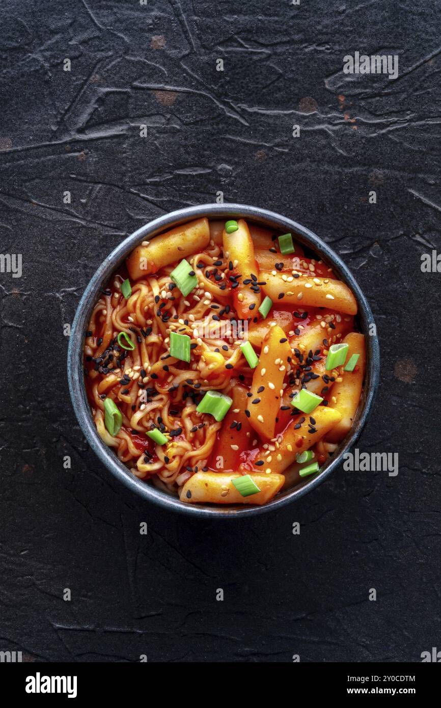 Rabokki, tteokbokki or topokki with ramen, Korean street food, spicy ...