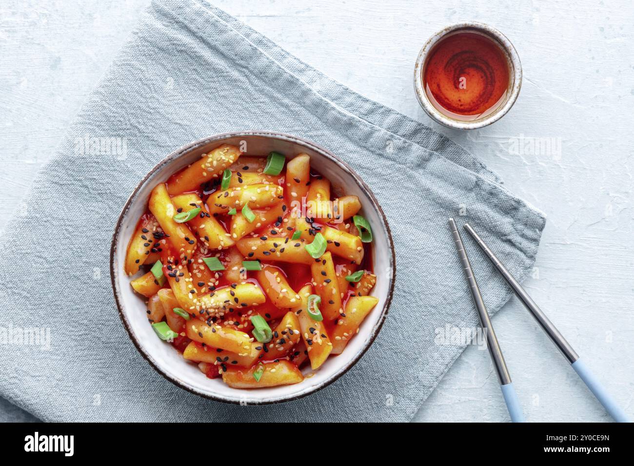 Tteokbokki or topokki, Korean street food, spicy rice cakes in red ...