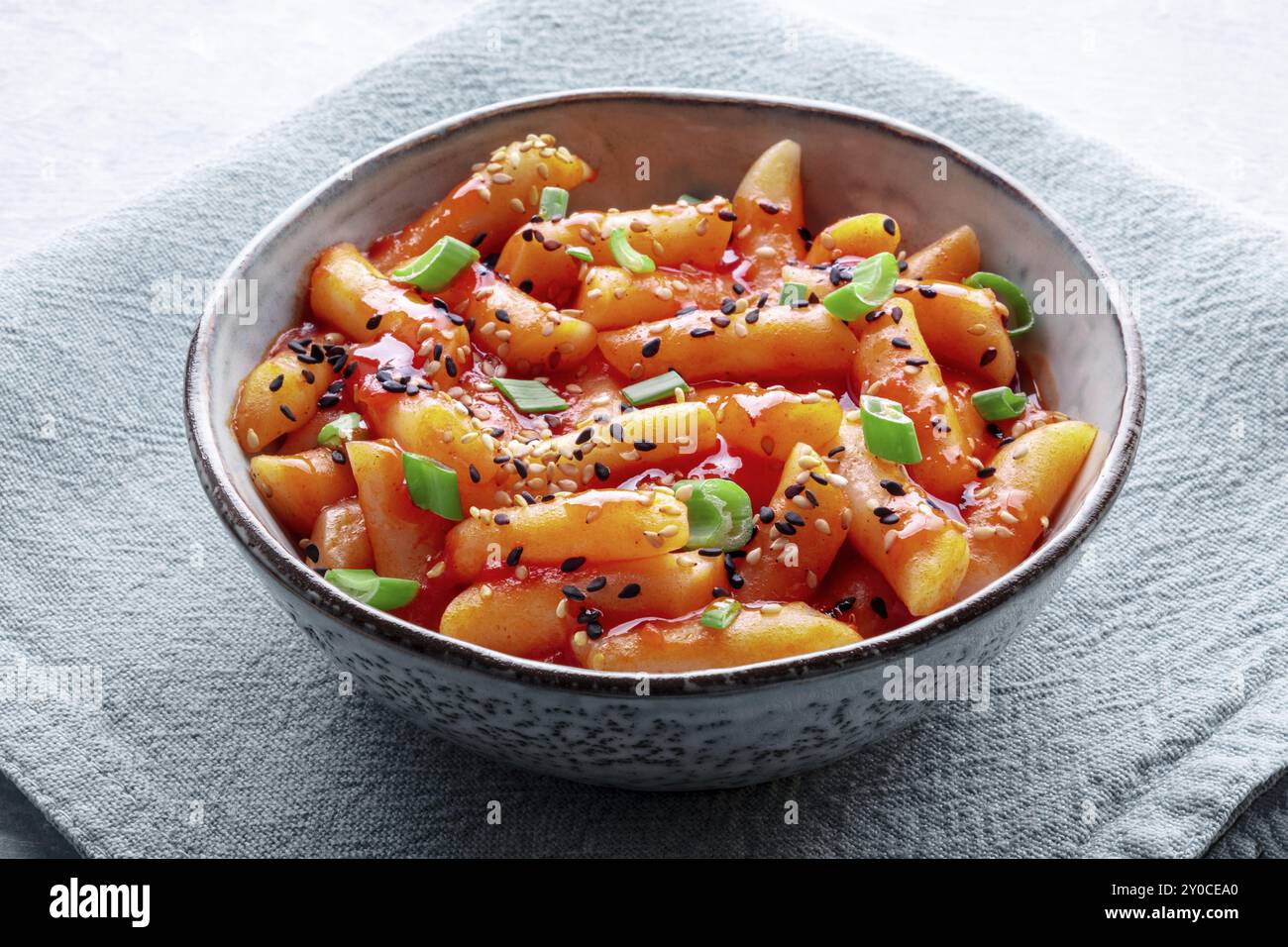 Tteokbokki or topokki, Korean street food, spicy rice cakes in red ...