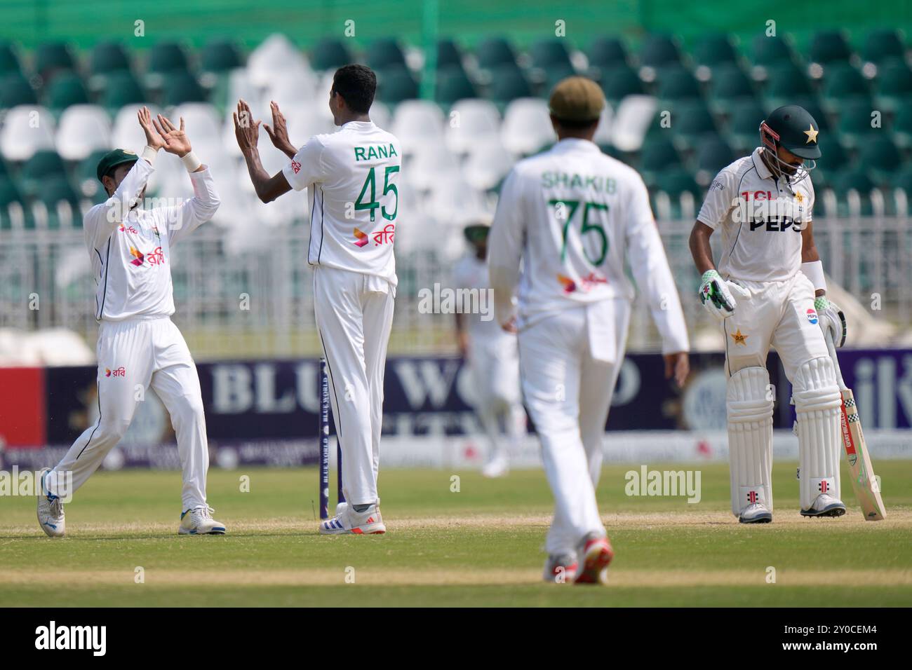 Bangladesh's Nahid Rana, second left, celebrates with teammate after ...